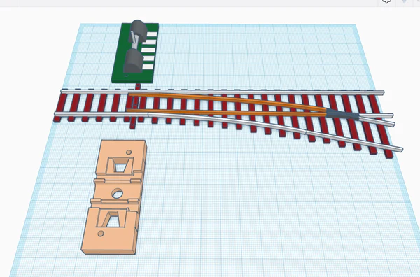 OO Gauge Universal Mounting Jig for SEEP motors | TierneyModelRailway