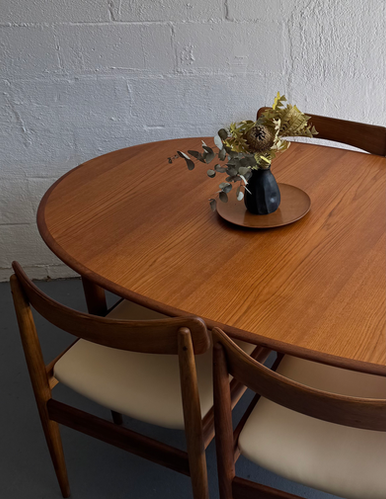 Parker oval dining table | Tangerine & Teal