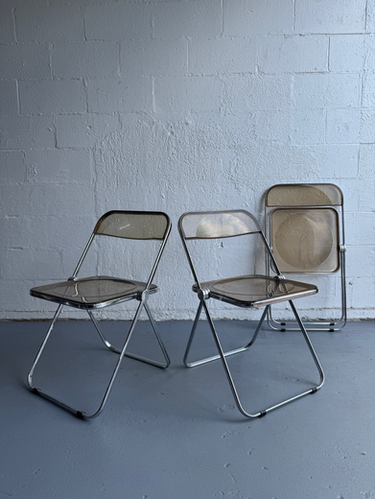 “Pila” folding chair by Giancarlo Piretti | Tangerine & Teal