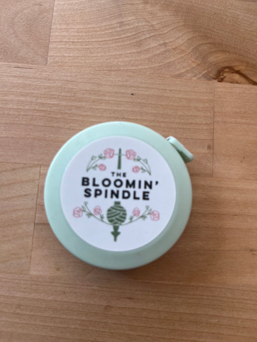 Tape Measures logo | The Bloomin' Spindle