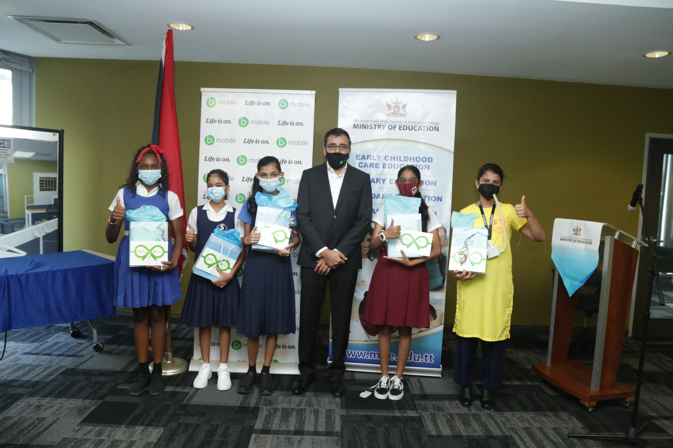 bmobile joins MOE to honour top SEA performers | TSTT