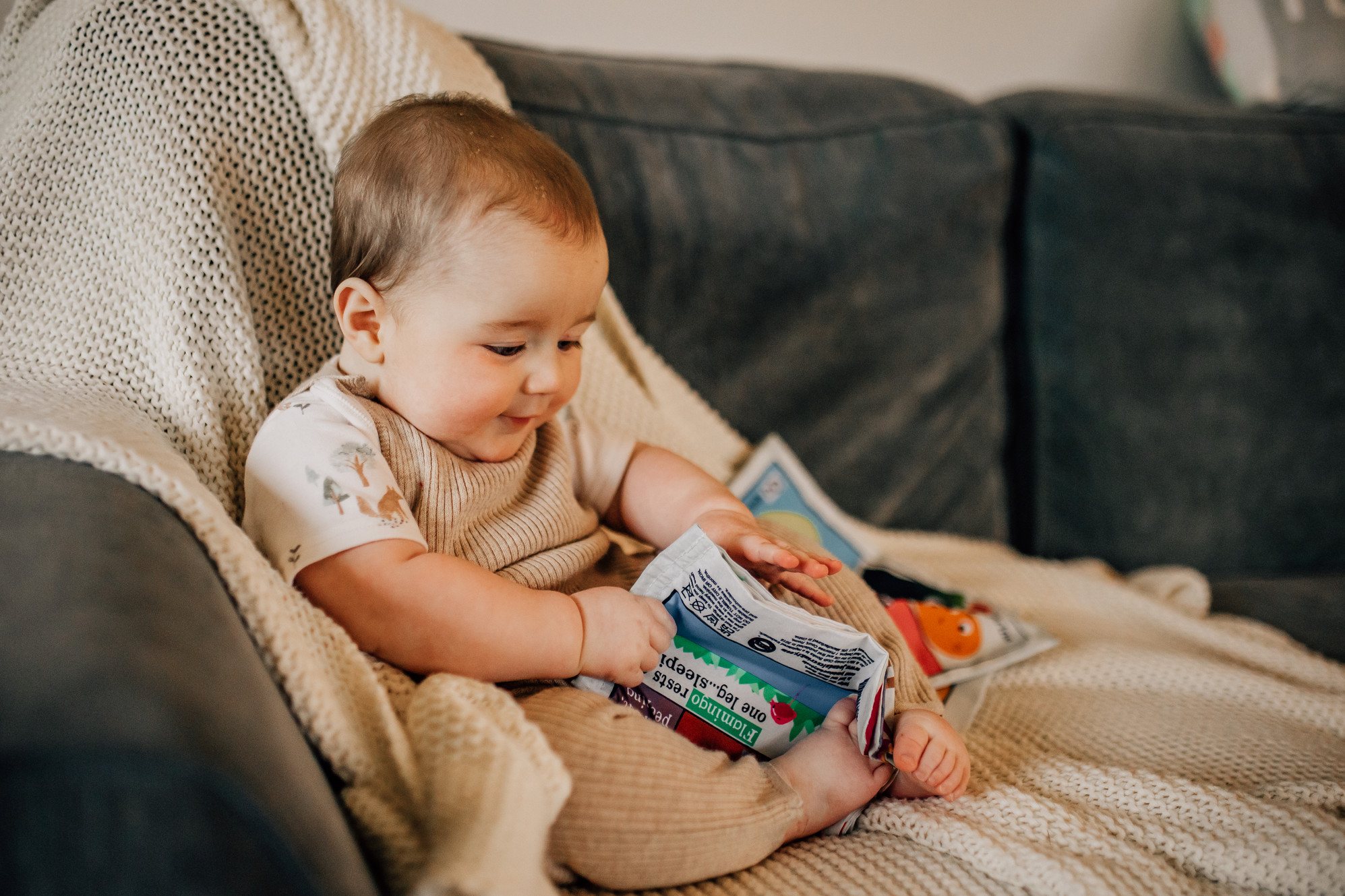 Crinkly cloth books for babies designed to look like newspapers