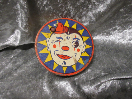 Litho Tin Toy Clown Noise Maker | Golgotha