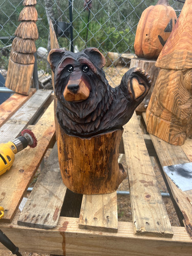 Chainsaw Carved Bear popping out of cedar log | Chainsaw Carved by N