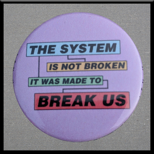 Broken System Button Badge | Mercenary Creative