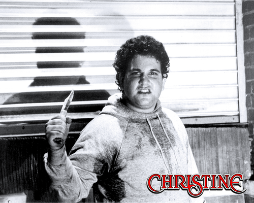 Signed cast photo of Moochie Holding Knife Print | Christine