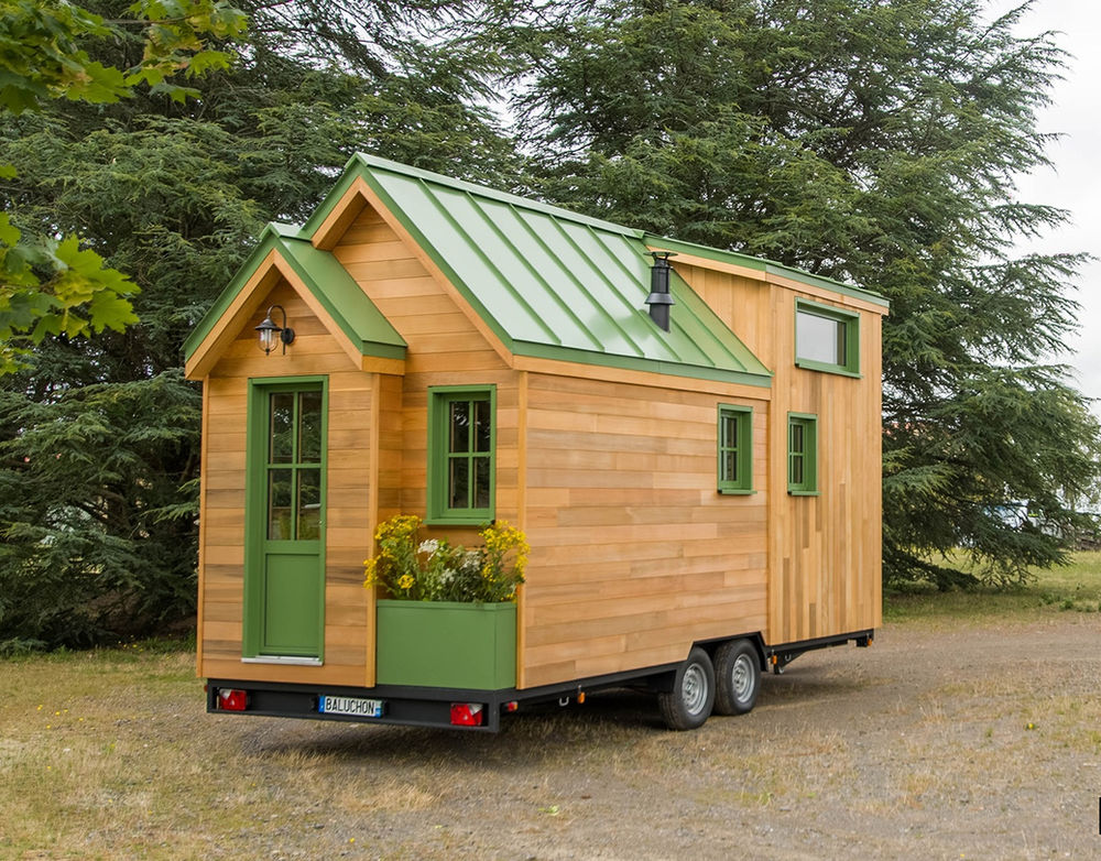 Stunning rustic-style Tiny House with a gable entrance.