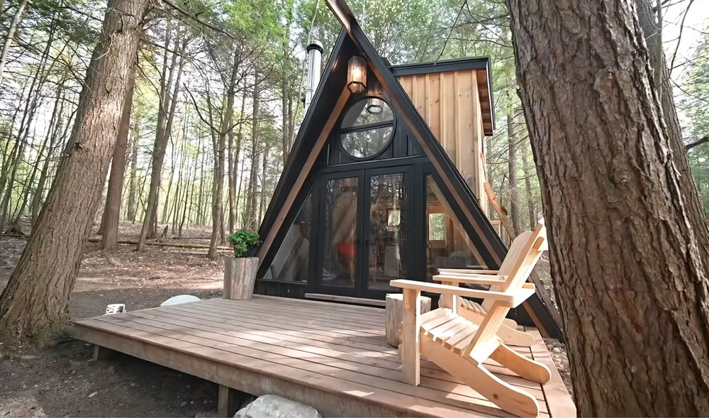 Tiny off-grid a-frame cabin self-built by family to be a cozy fairy ...