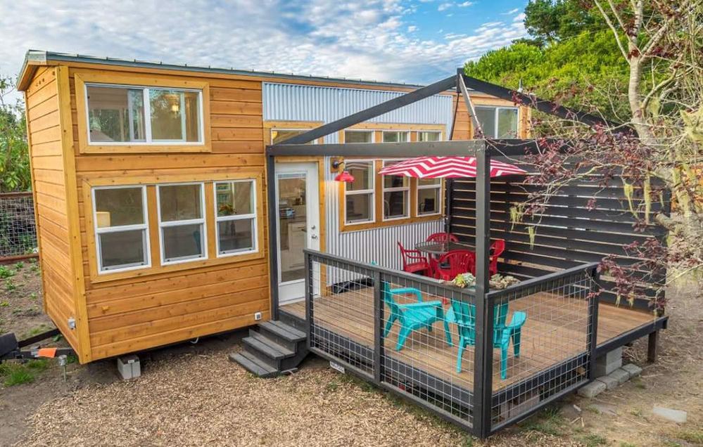 Beautiful 28' Tiny House, features a side entry.