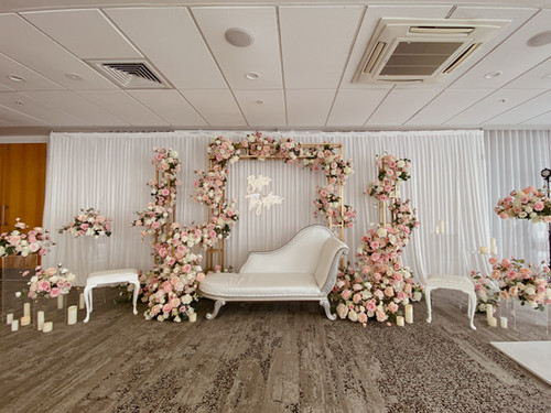B36. Golden truss frame with floral | The Journey Wedding