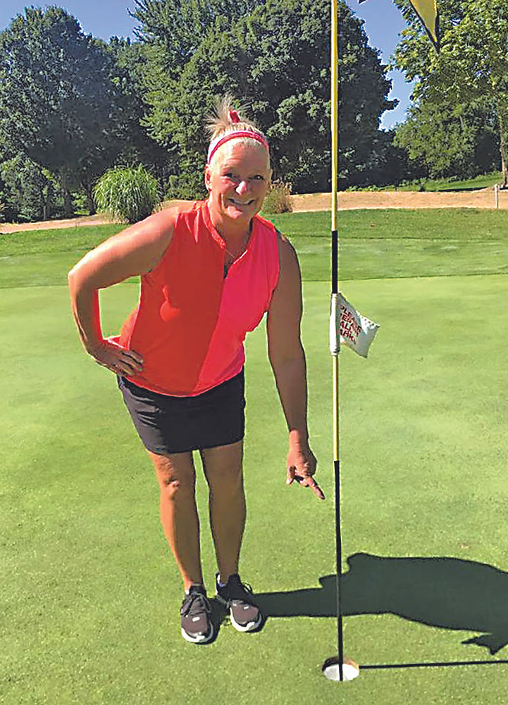 Karen Pfeffer makes a Hole-In-One