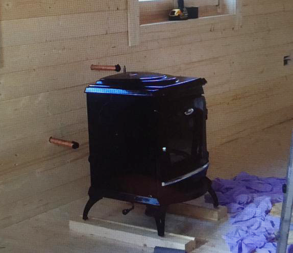 Can I install a stove in a log cabin? | Timber Living