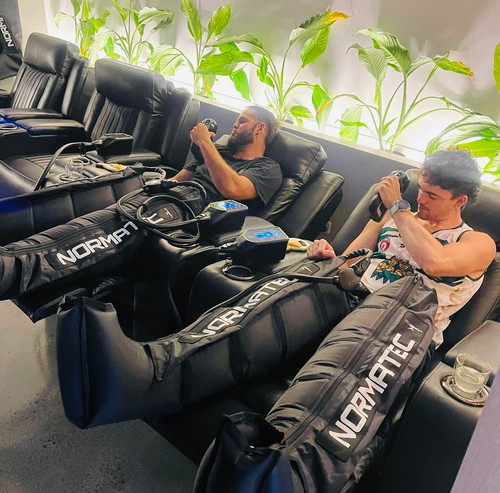 NORMATEC COMPRESSION BOOTS WITH PERCUSSIVE MASSAGE GUNS | Bodicove