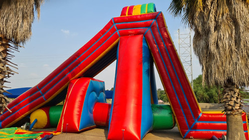 item 36 - Giant water slide 8m high for hire | Party jumping castle