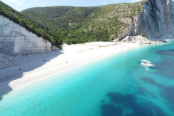 Fteri Water Taxi | Boat To Fteri Beach | Zola