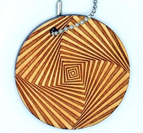 Pinwheel optical illusion keychain | Karen DeGuire