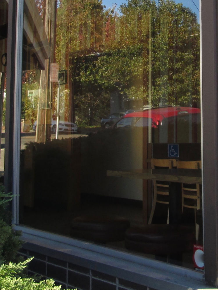 Transforming clear glass to “one way” glass