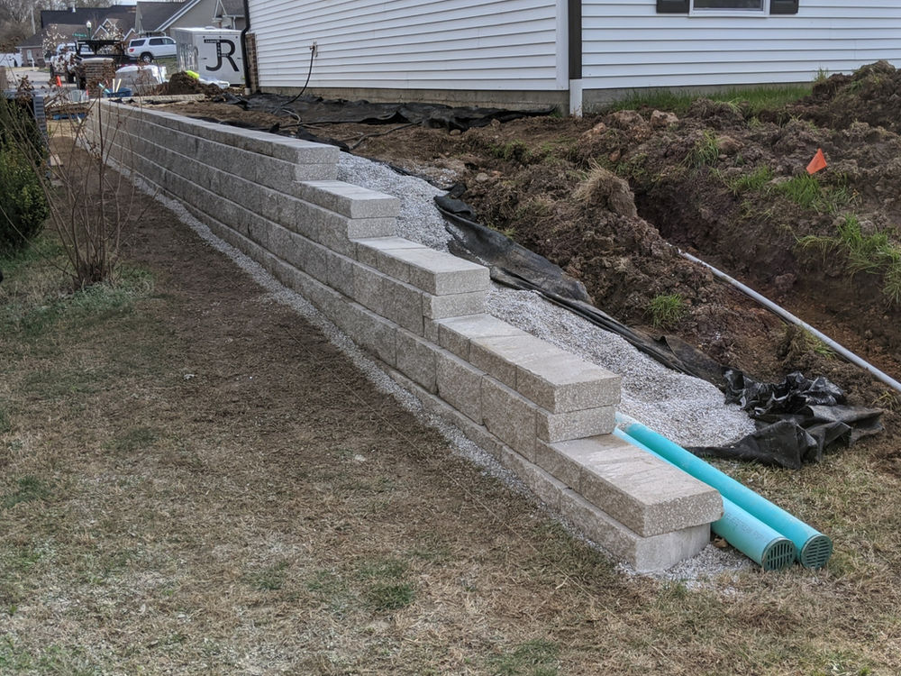 Building a Retaining Wall with Concrete Paver Blocks