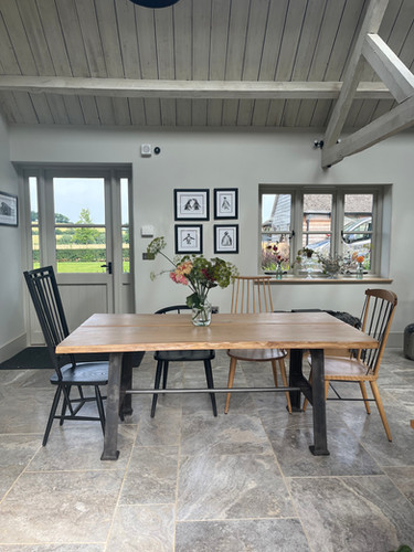 Dining table with cast iron underframe and English elm top. | Discovered
