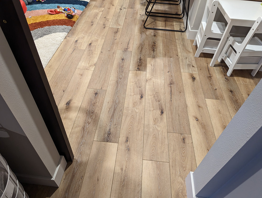 Tile & LVP installation in Marion - white tile bar + luxury vinyl plank ...