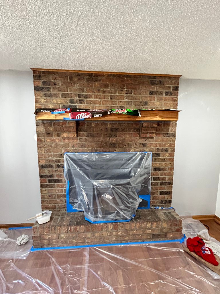 DIY easy whitewash brick fireplace