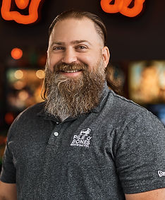 pile of bones tattoo regina