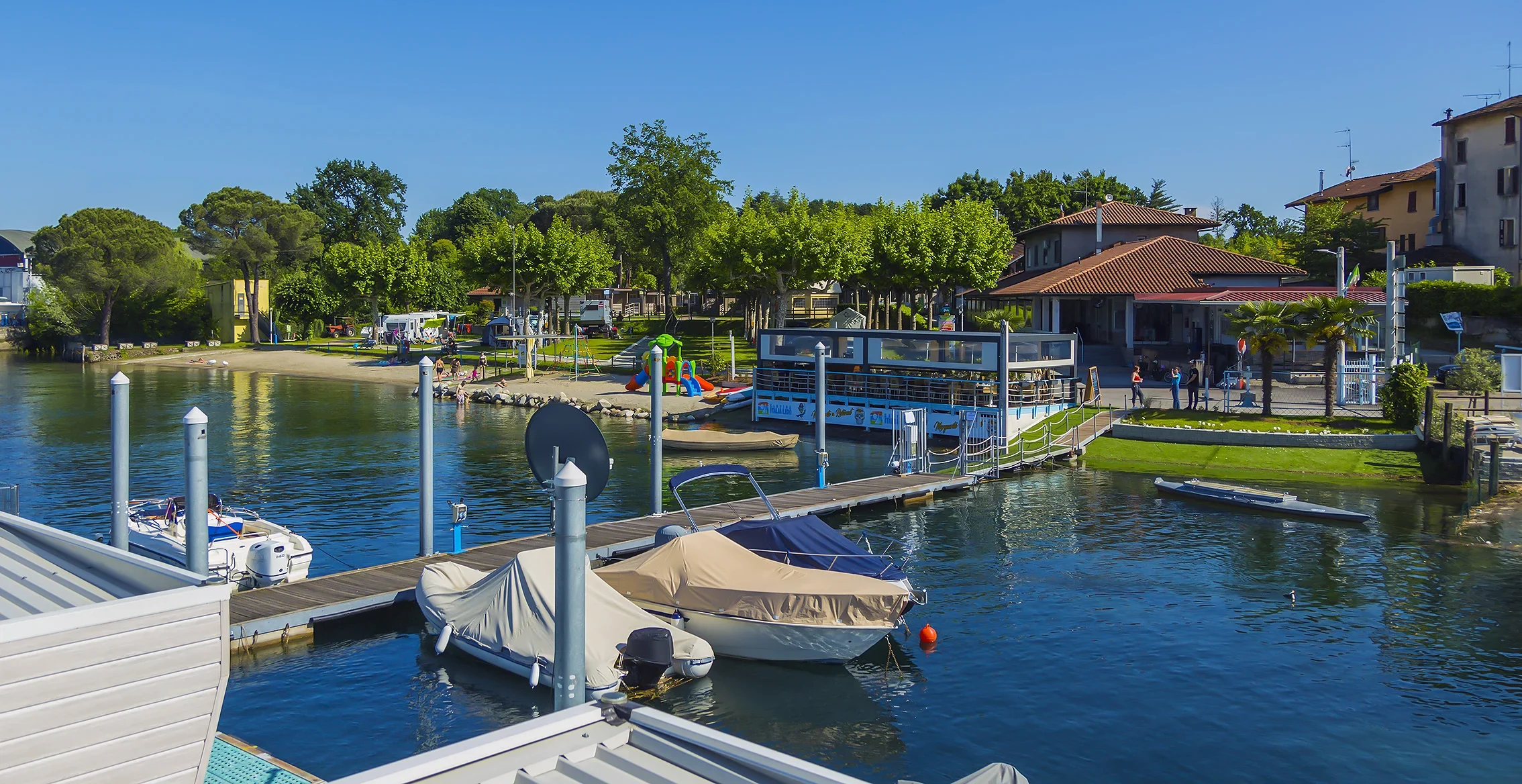Nautica | Pontile con posto barca | Camping Italia Lido | Lago Maggiore