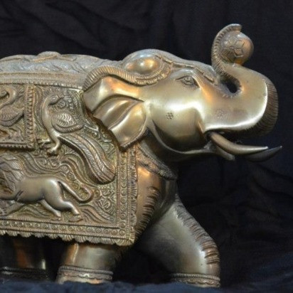 Elephant Statue with Upraised Trunk | InDesign