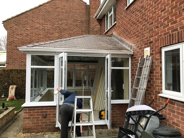 Solid roof conversion of an existing conservatory