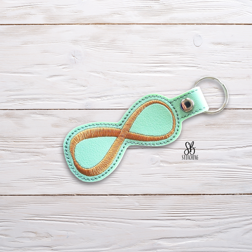 Gold Infinity Sign Snaptab Machine Embroidery Design | SB Stitching