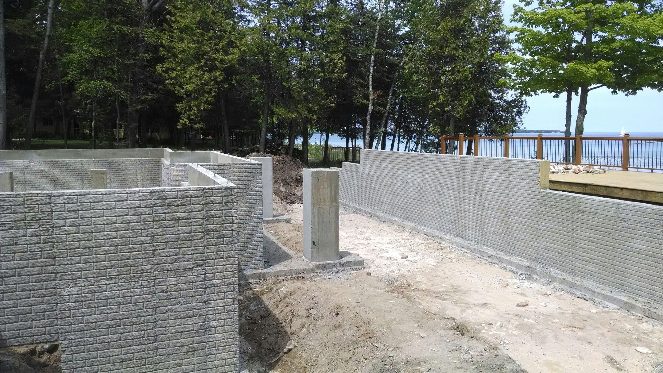 Brick texture and smooth poured walls