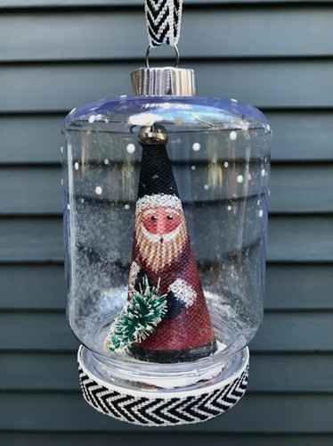 4227 Woodsman Snow Globe ornament | reflections
