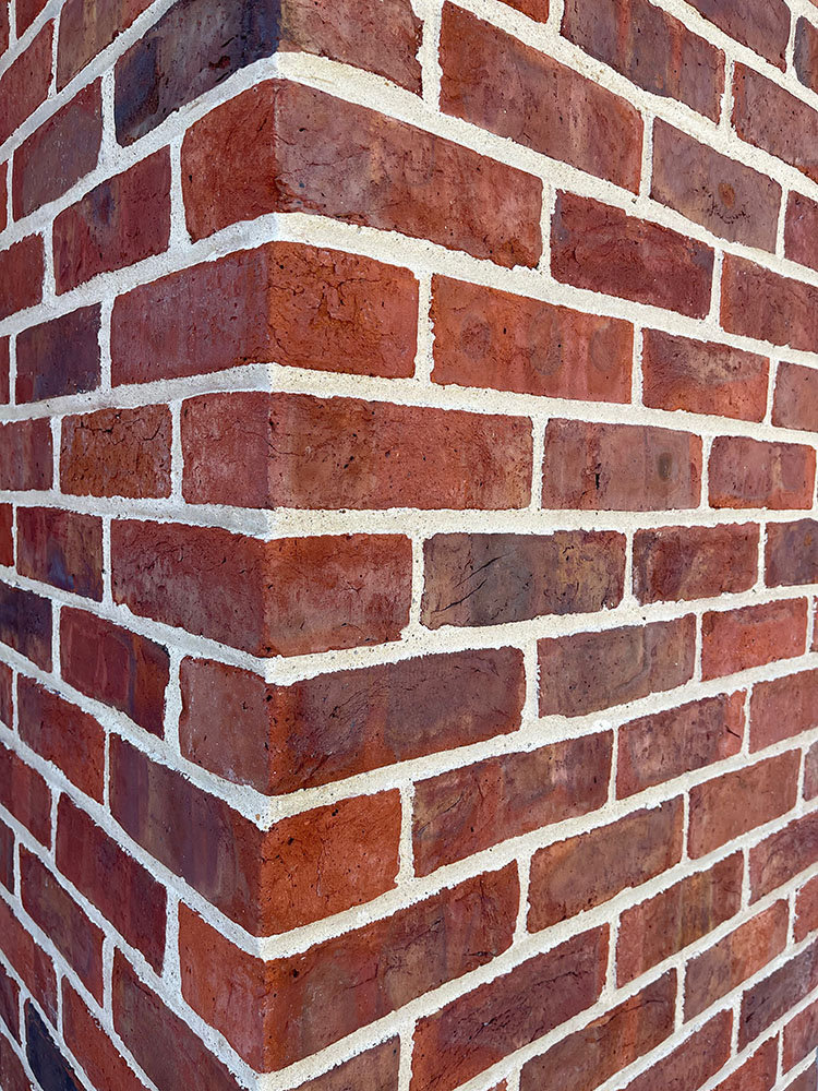 Up close with waterstruck red bricks