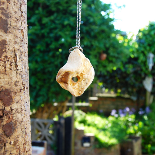 Hanging hag stone | Fossilbox