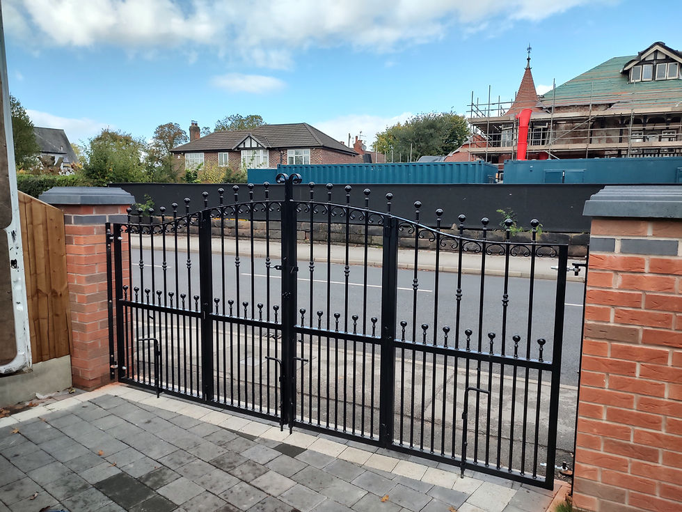MH05, Arched bi-folding driveway gate | MH Gates Ltd