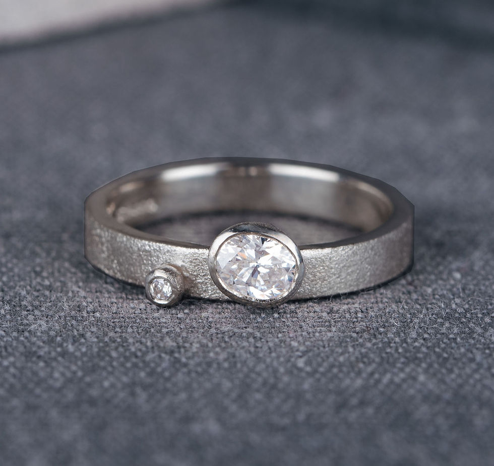 Asymmetrical engagement ring in platinum and Diamond | samantha-england