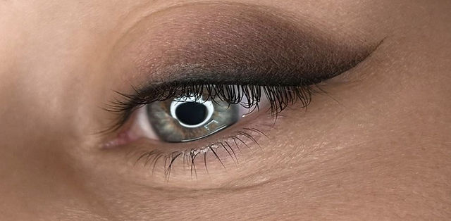 grey shadow behind eye