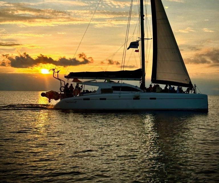 Book (3hr) Private Catamaran Sunset Sail Charter in Cozumel