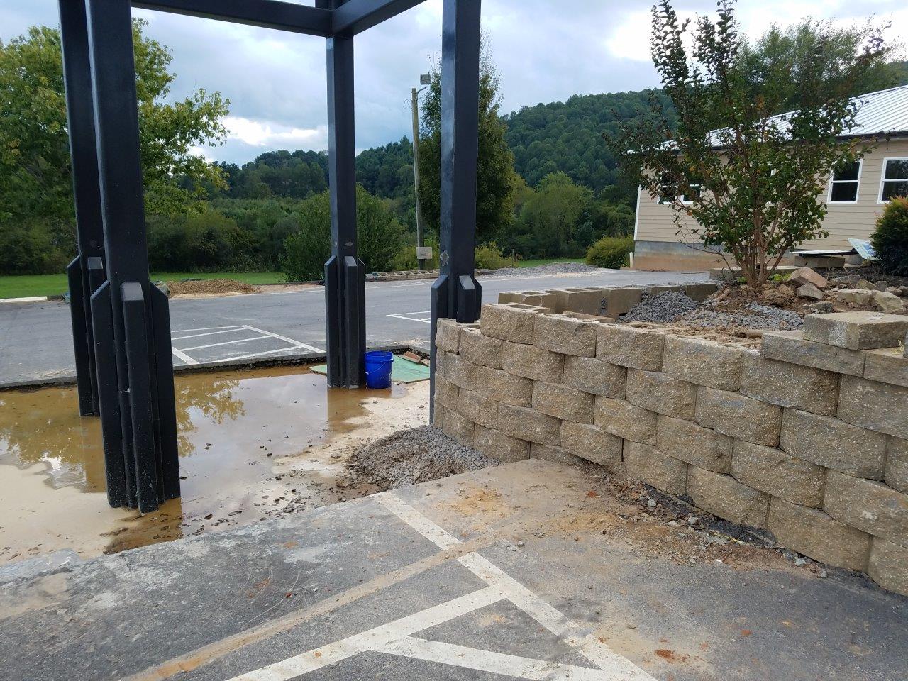 Day 48 of Construction: Rock wall, retaining wall, and gutters – All ...