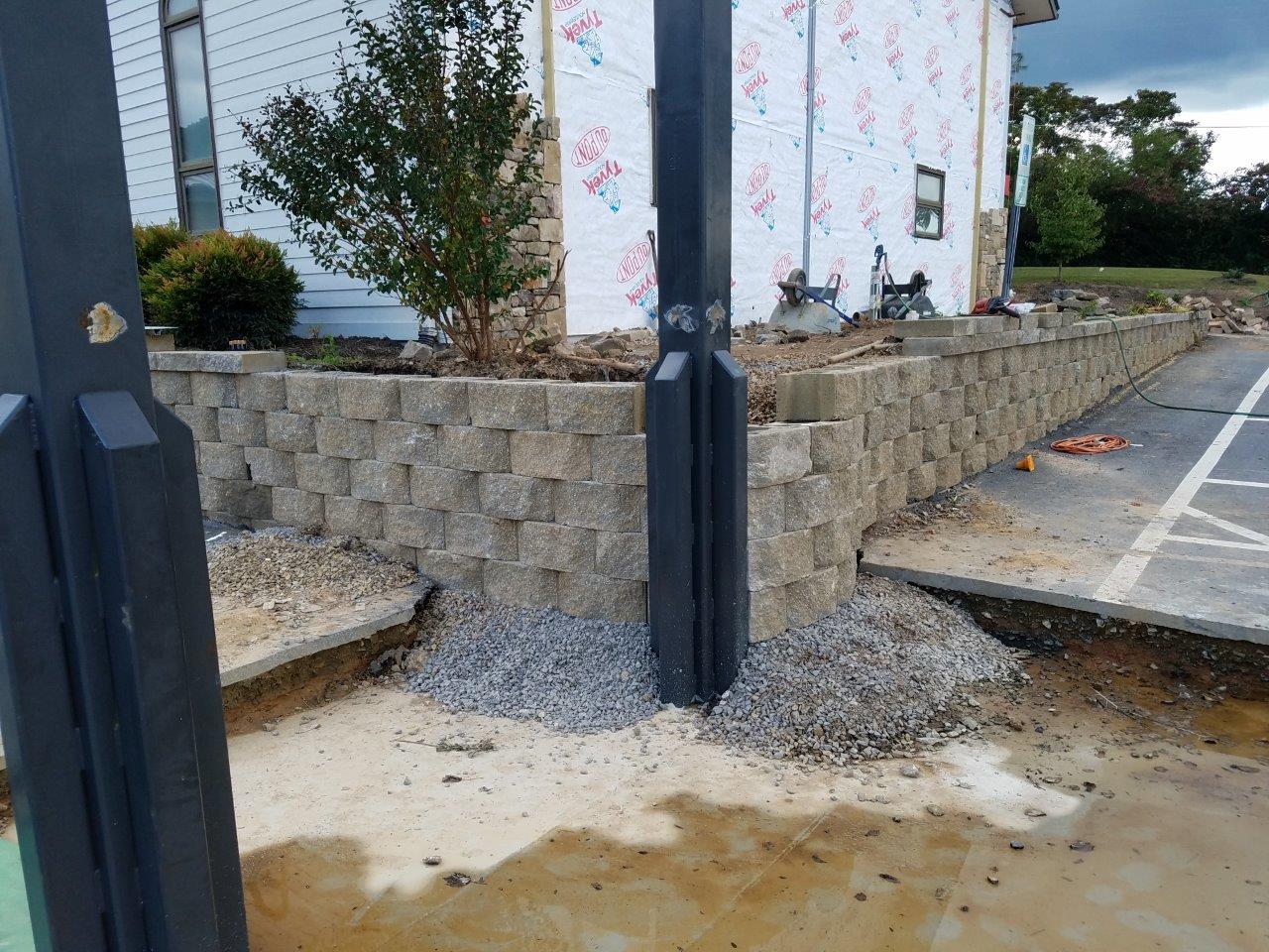 Day 48 of Construction: Rock wall, retaining wall, and gutters – All ...