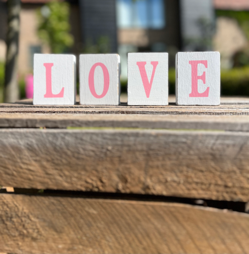 Mini white wooden "LOVE" cubes | TheStablesPropHire