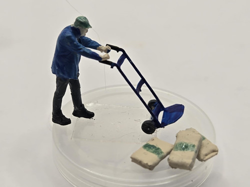 HO Scale worker with Dolly and feed sacks | Yelton Models