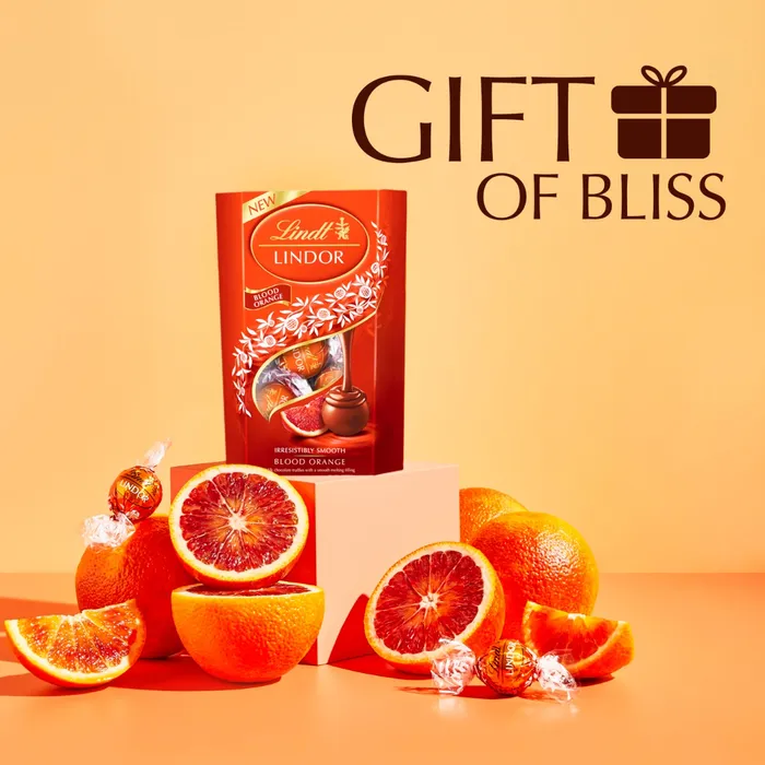 Lindt Lindor Milk Blood Orange Chocolate Truffles 200g | Secret Gift Guru