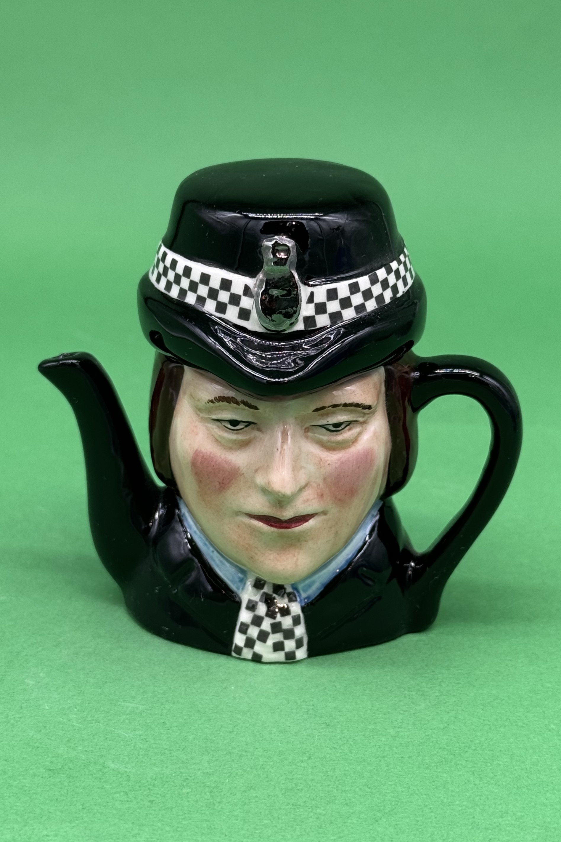 Police Woman teapot - Artone Pottery circa 1980