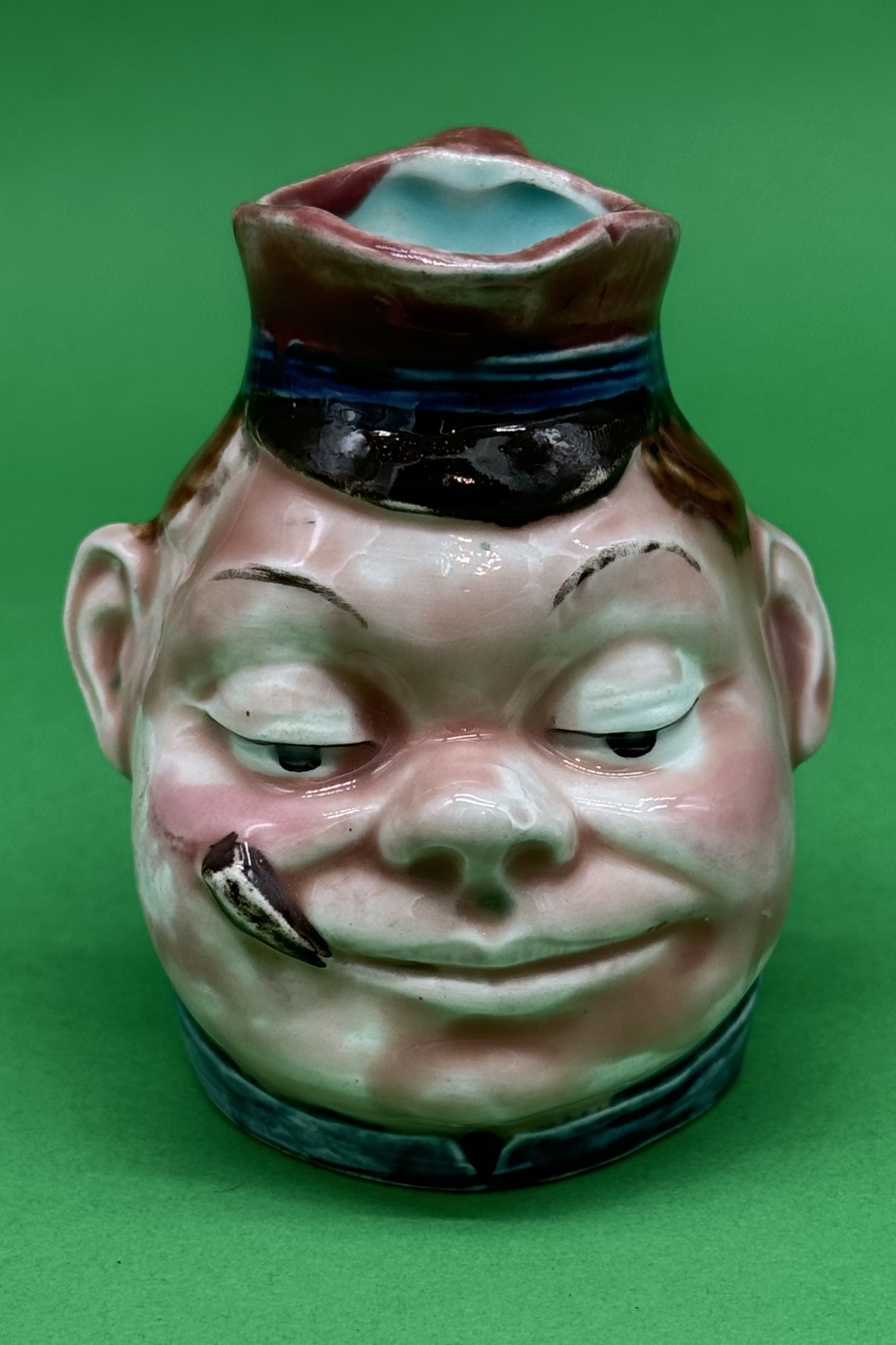Smoker Smiling character jug red - Austria circa 1925