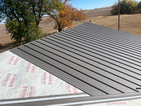 can you put corrugated metal over shingles