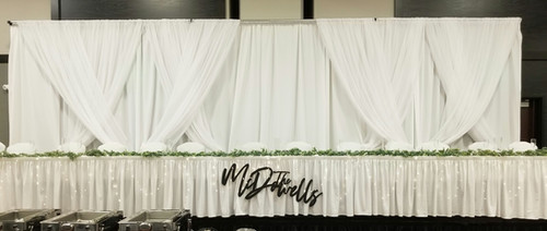 Double rod backdrop with "X" design | The Wedding Sisters
