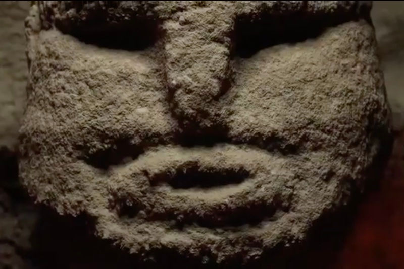 In Karahan Tepe, a statue head and ritual areas carved into the bedrock ...