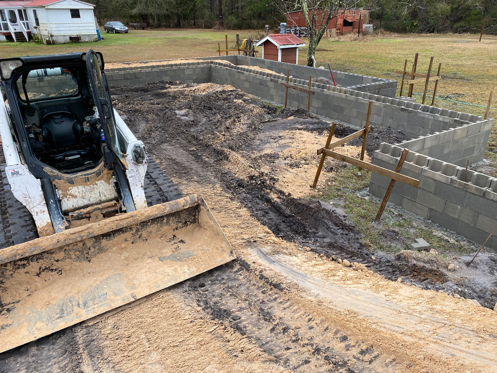 Filling Foundation with Fill Dirt in White City, Fl.