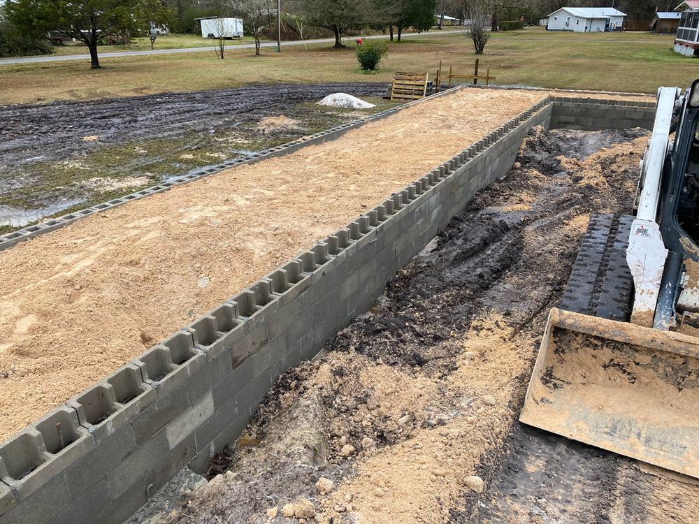 Filling Foundation with Fill Dirt in White City, Fl.